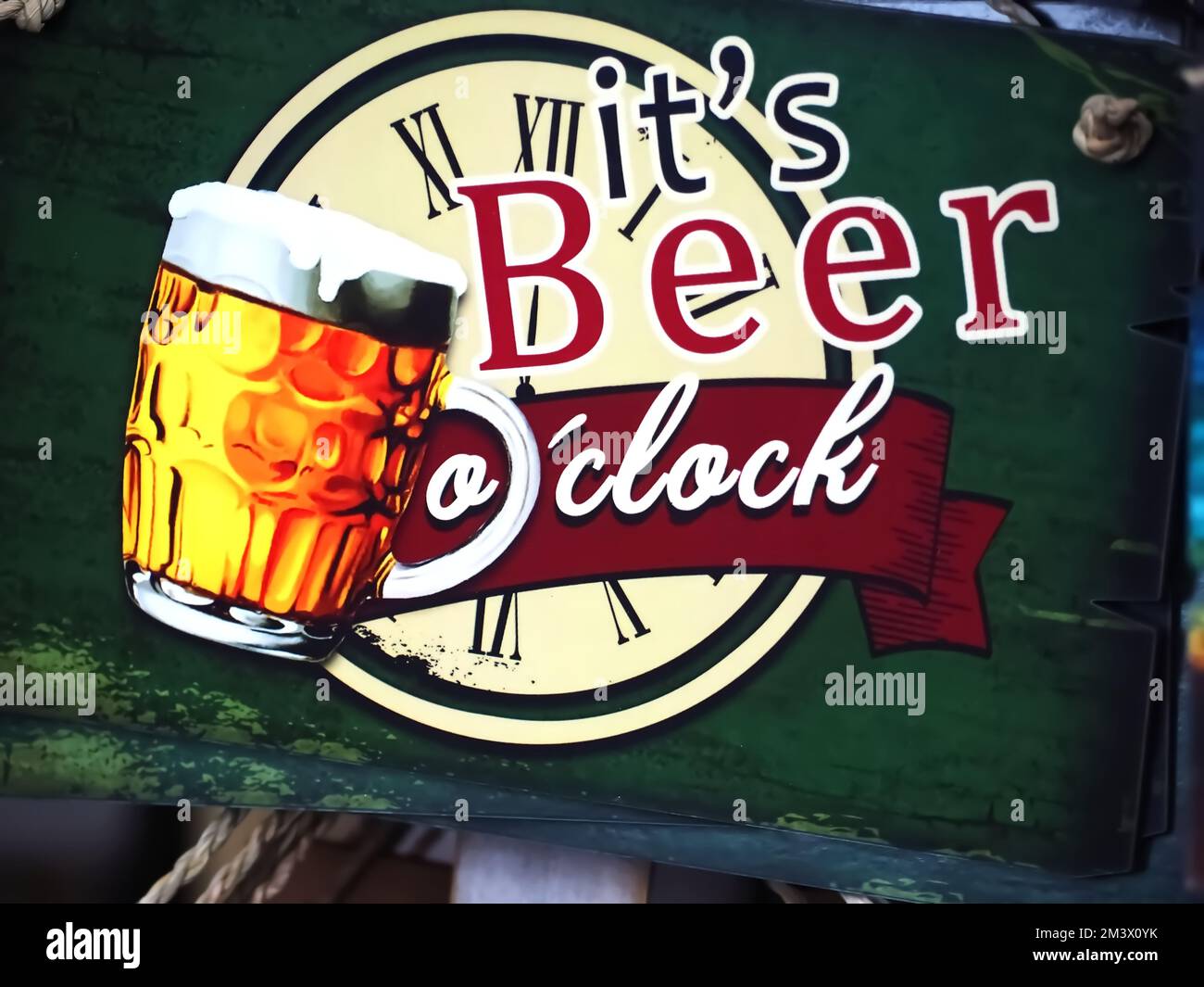 Colorful wooden sign its beer o clock Stock Photo - Alamy