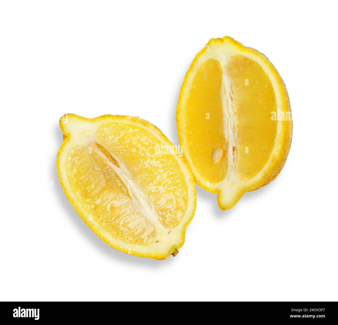 ripe lemon cut in half on a white background Stock Photo - Alamy