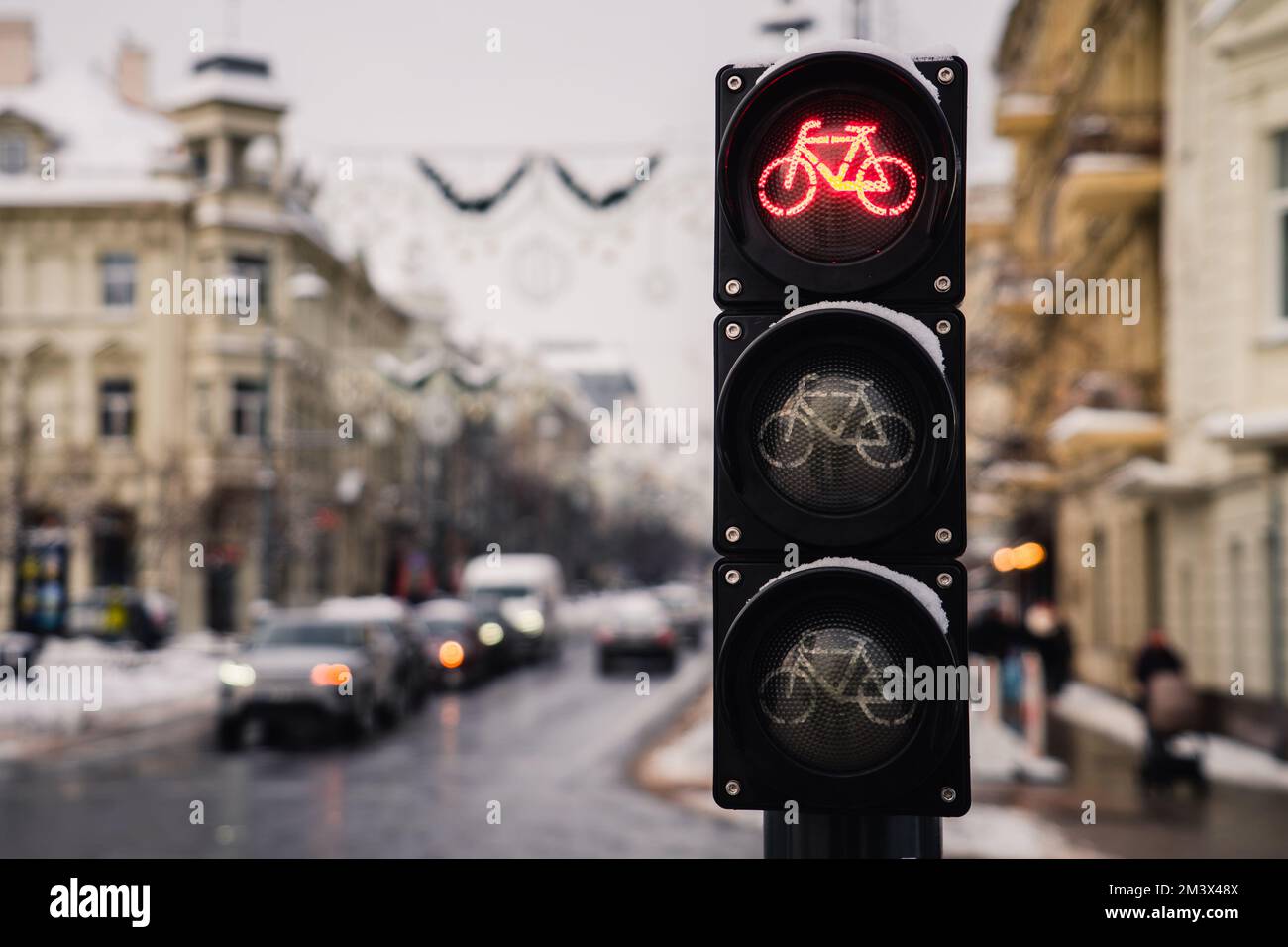 Bicycle traffic light with bicycle icon and active red resolving light ...