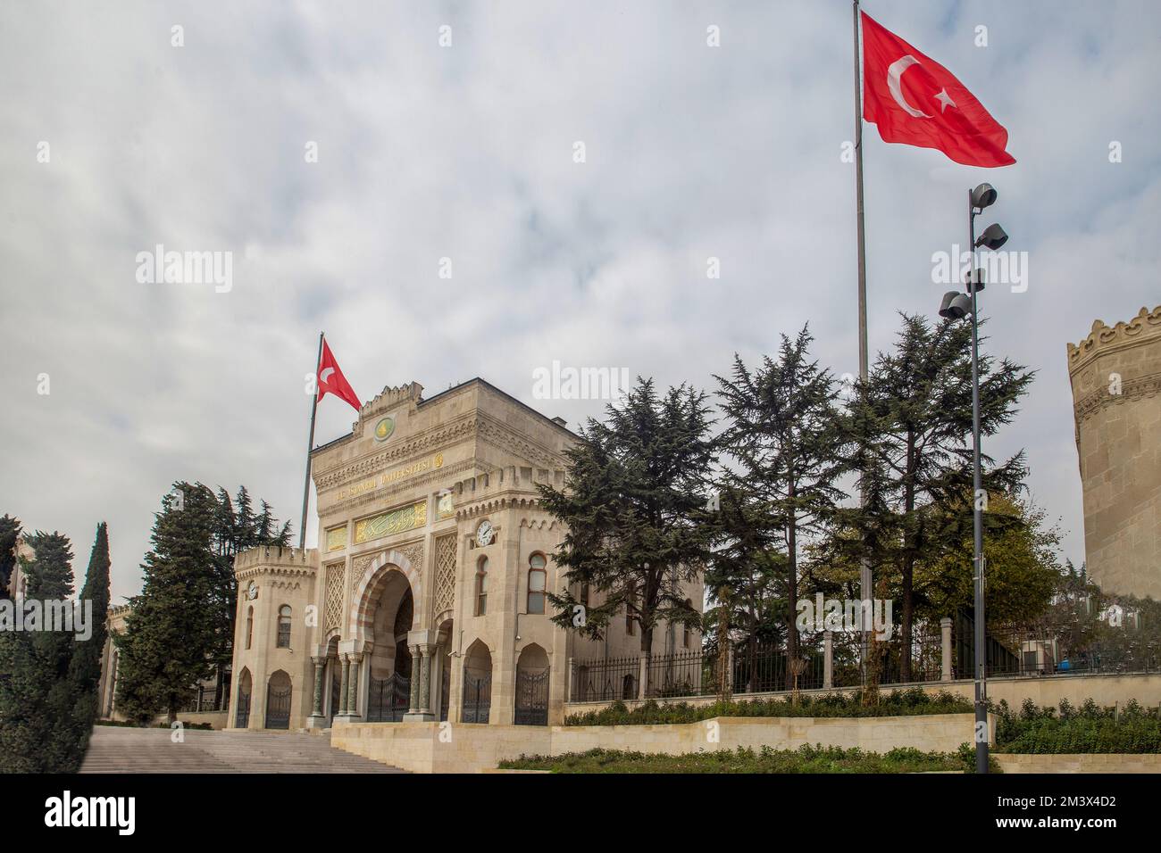 Entrance building of University of Istanbul with giant Turkish flags ...