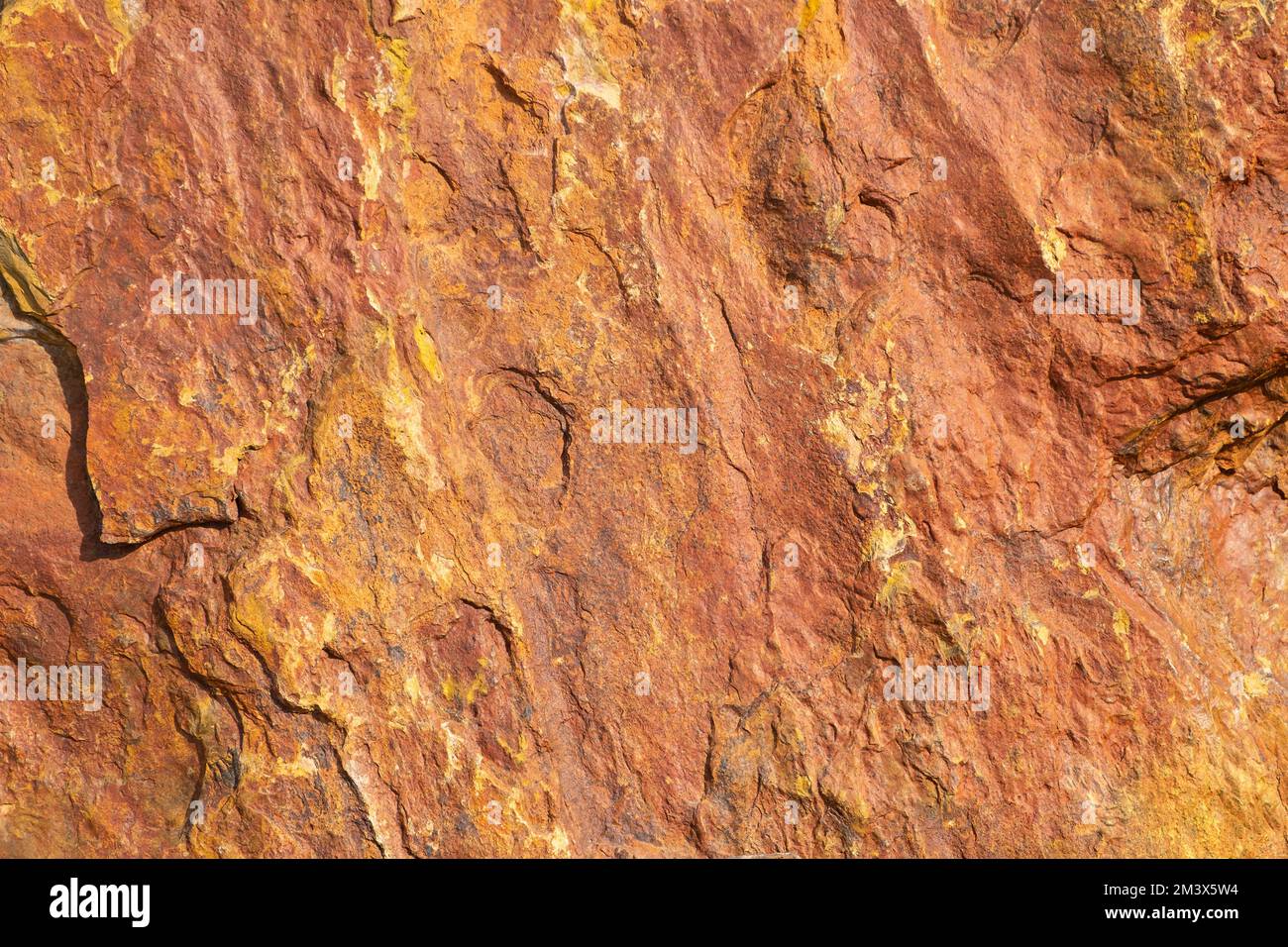 Rusty Orange color stone texture Background. Decorative Rock stone ...