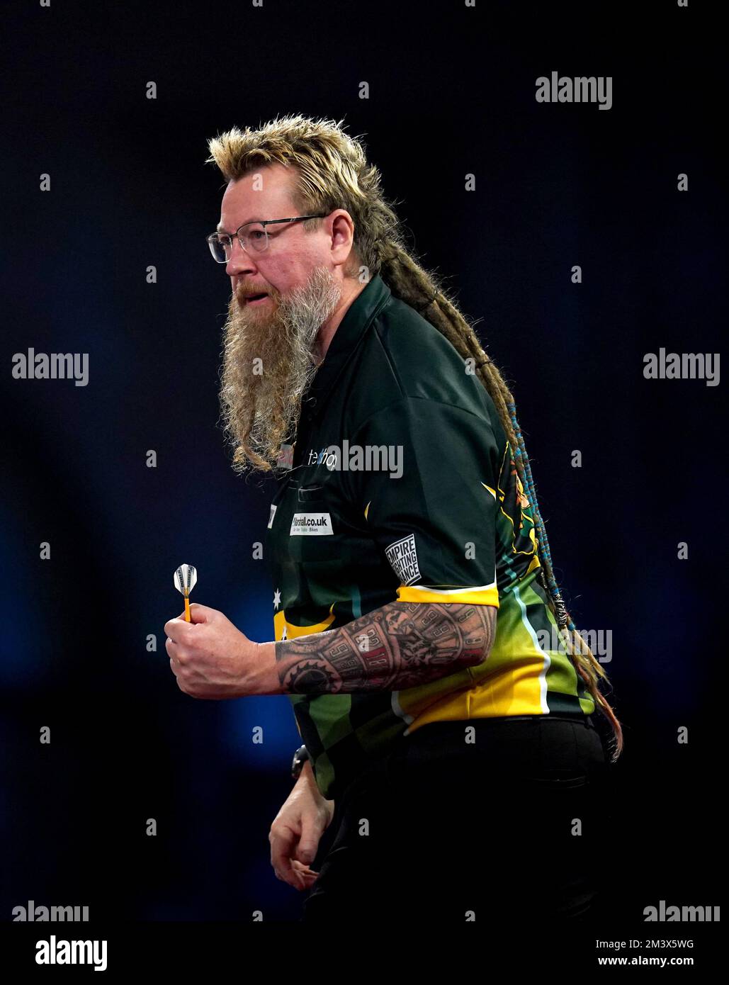 Simon Whitlock celebrates during his match against Christian Perez ...