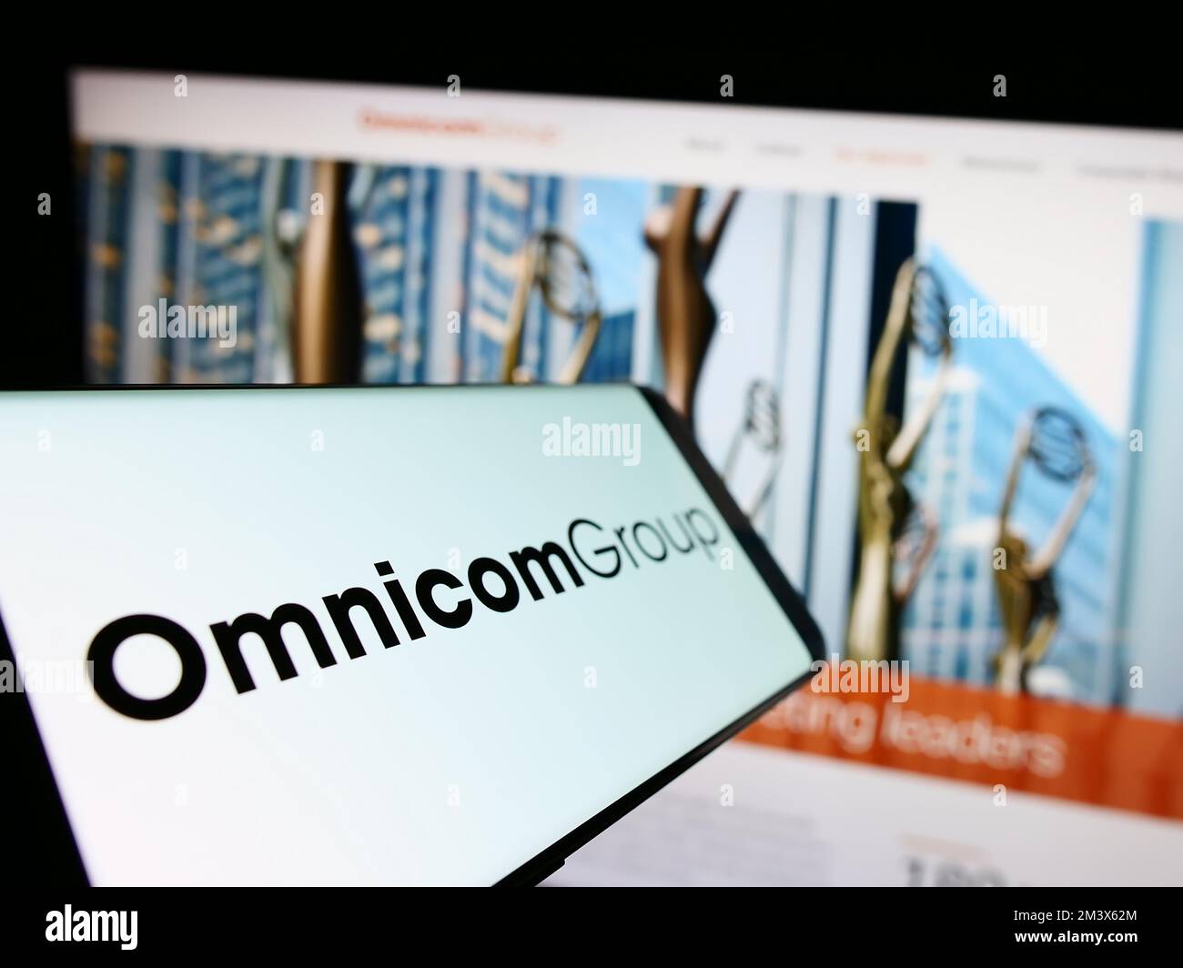Smartphone with logo of American media company Omnicom Group Inc. on ...