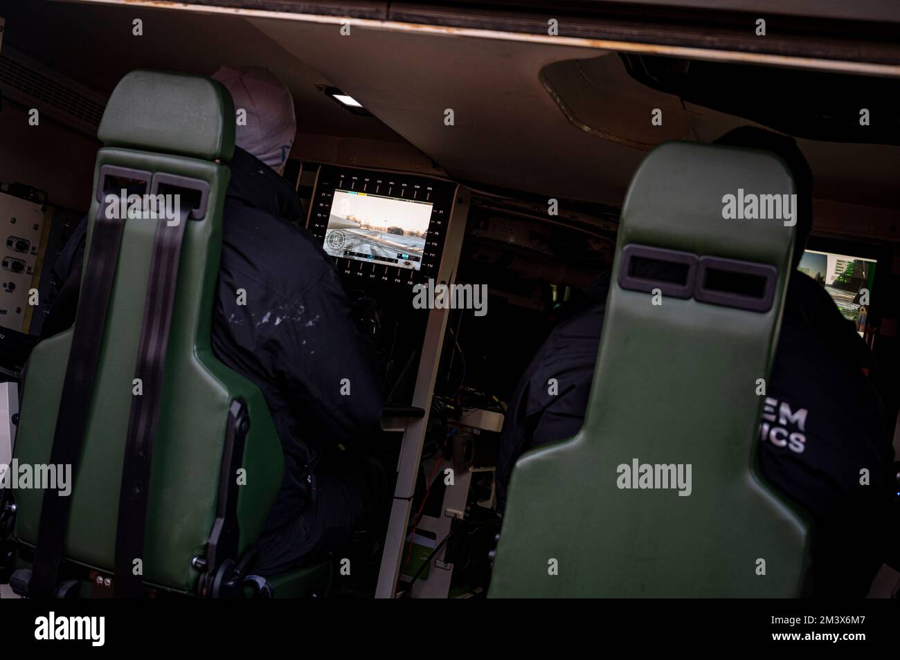 15 December 2022, Brandenburg, Brück: Two employees of the manufacturer ...