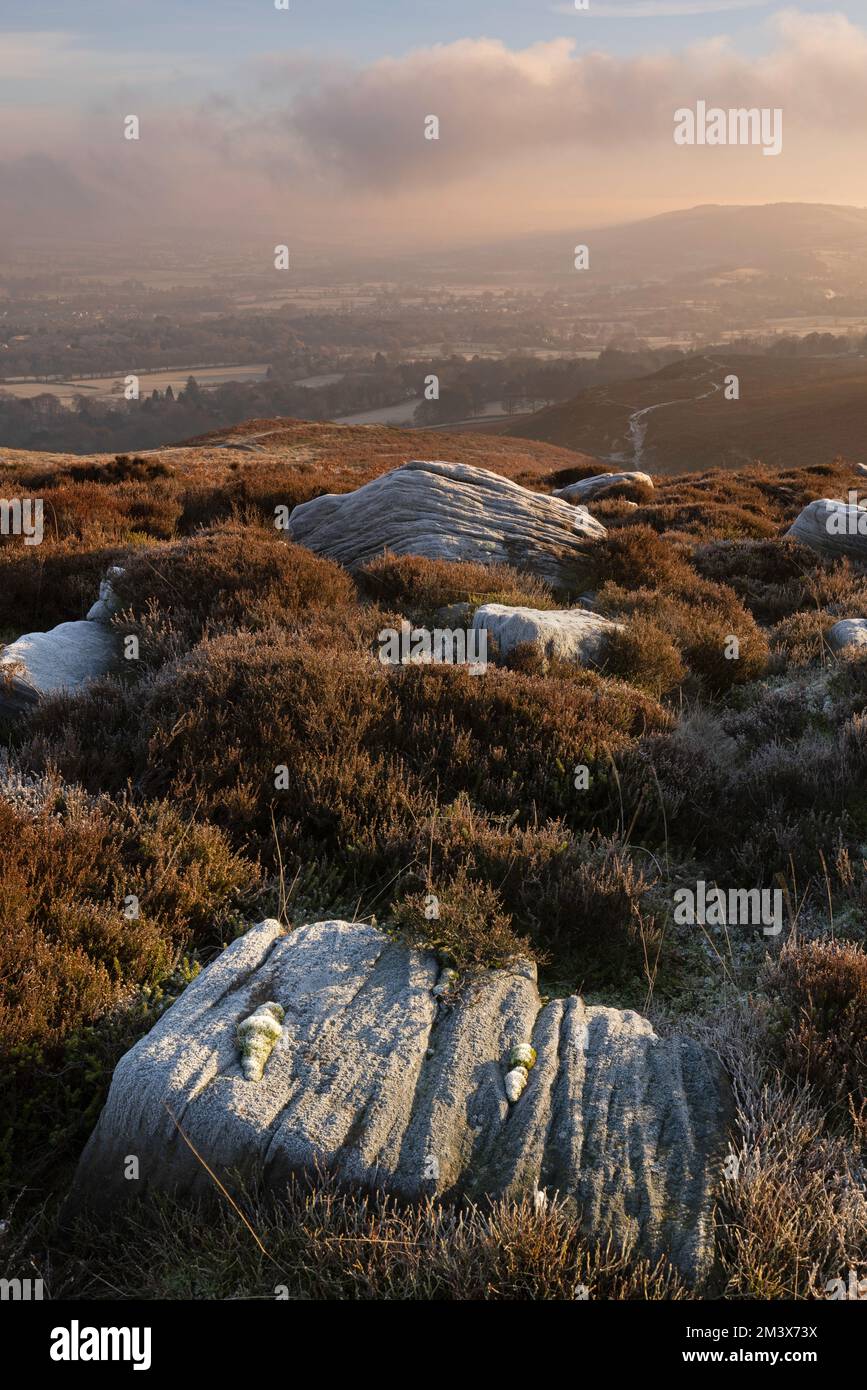 Frost covered rocks on the moors overlooking Burley-in-Wharfedale in ...