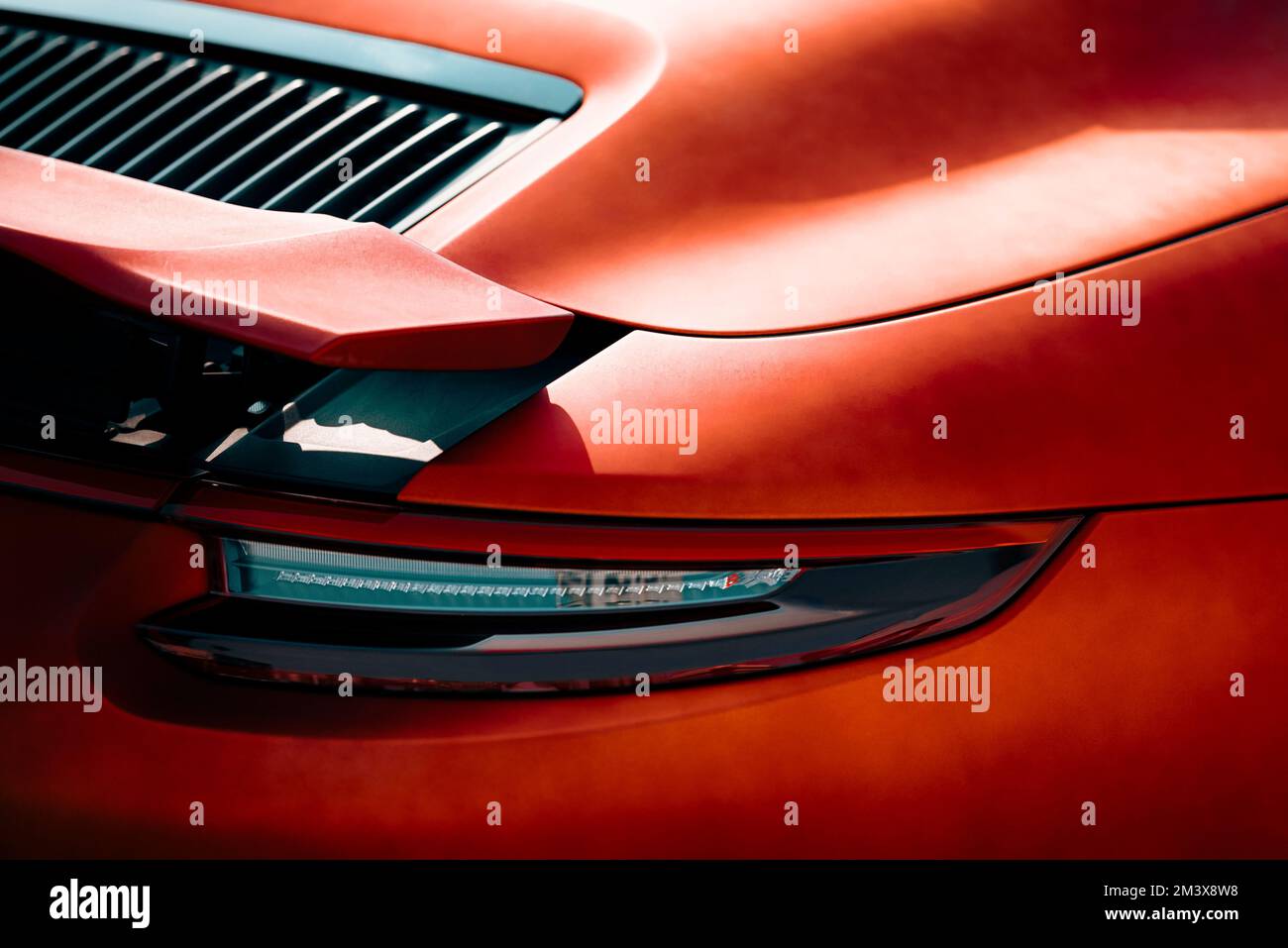 The tail lights of a red Porsche 911 Carrera 4 GTS Stock Photo - Alamy