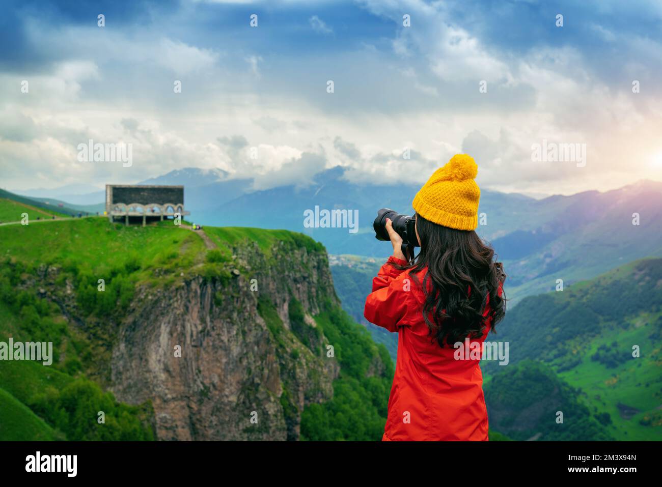 Tourist take a photo near Russia Georgia friendship monument on the ...