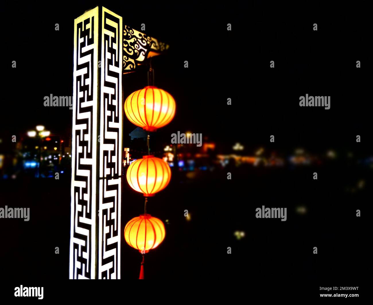 Three lanterns hanging from the pole - all in Chinese style Stock Photo ...