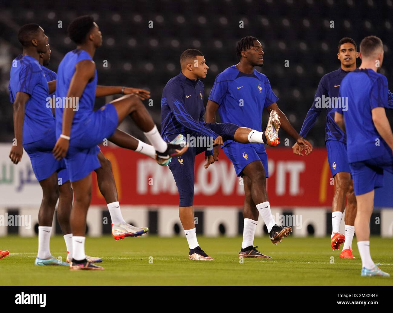 France's Kylian Mbappe (centre) during a training session at Al Sadd SC ...