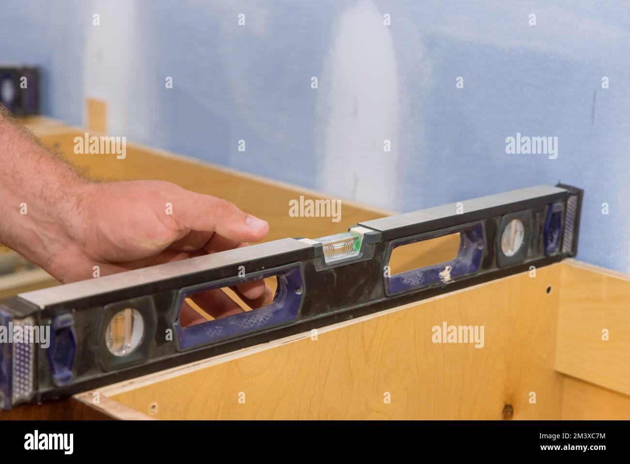 In order an install kitchen cabinets accurately, it is necessary to use ...