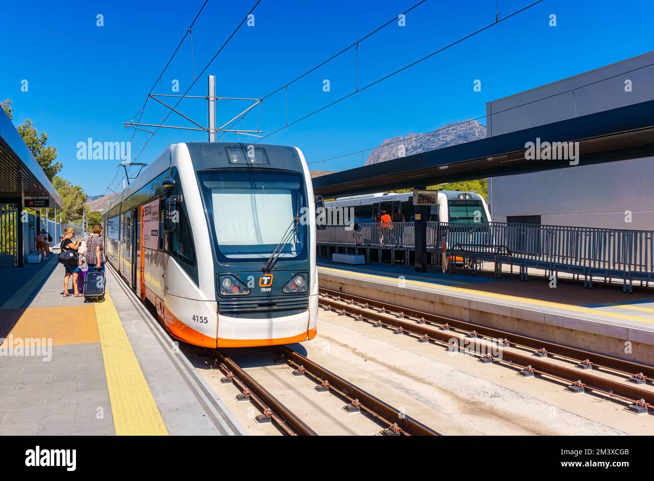 Train in station platform, Benidorm, Alicante, Spain Stock Photo - Alamy