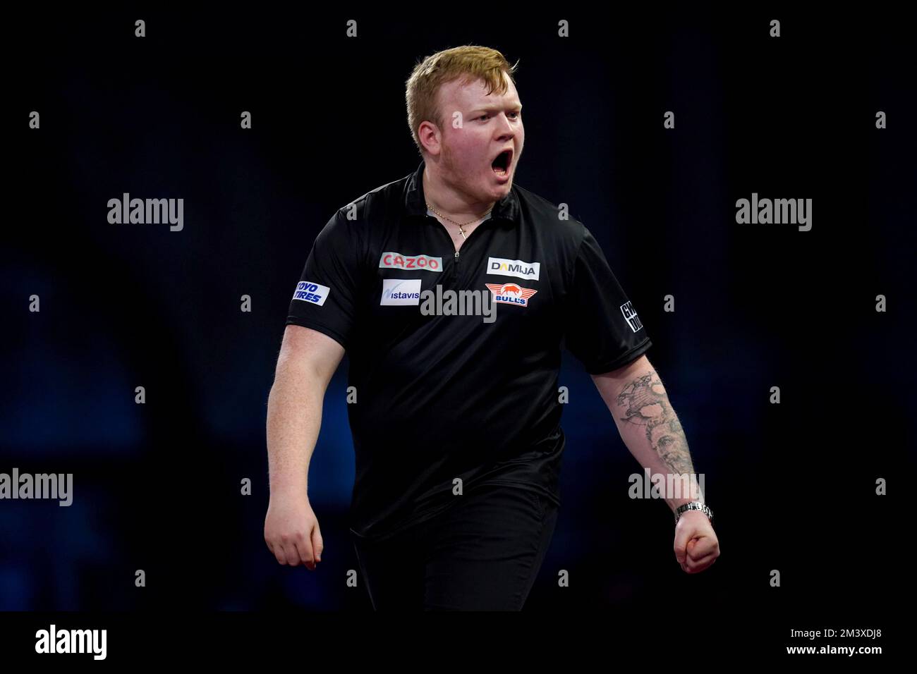 Adam Gawlas celebrates during his victory over Richie Burnett during ...