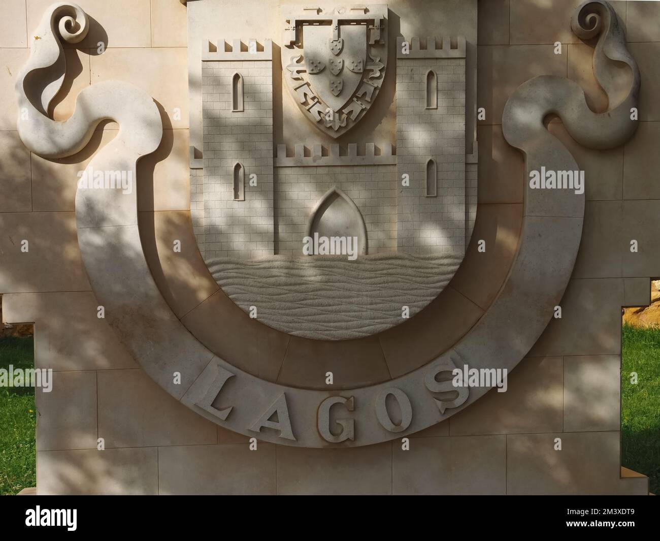 Coat of arms sculpture at the castle of Lagos in Portugal Stock Photo ...