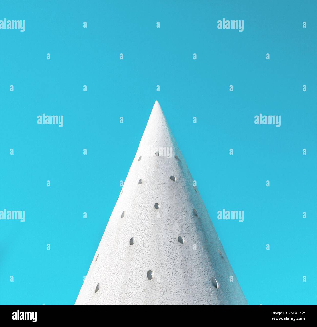 A low-angle shot of the cone-shaped building in The City of Arts and ...