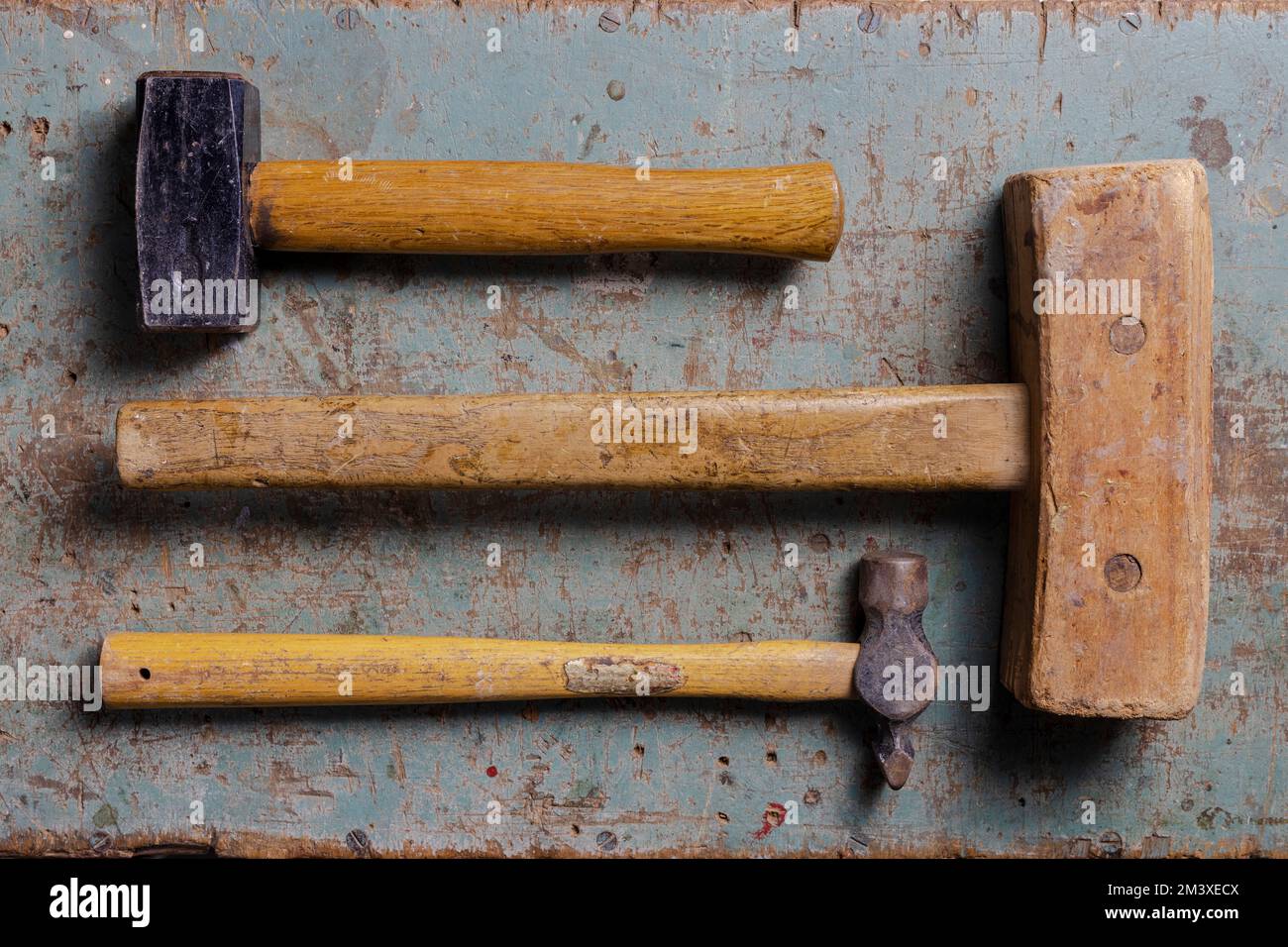 Three different types of retro hammers flat lay Stock Photo - Alamy