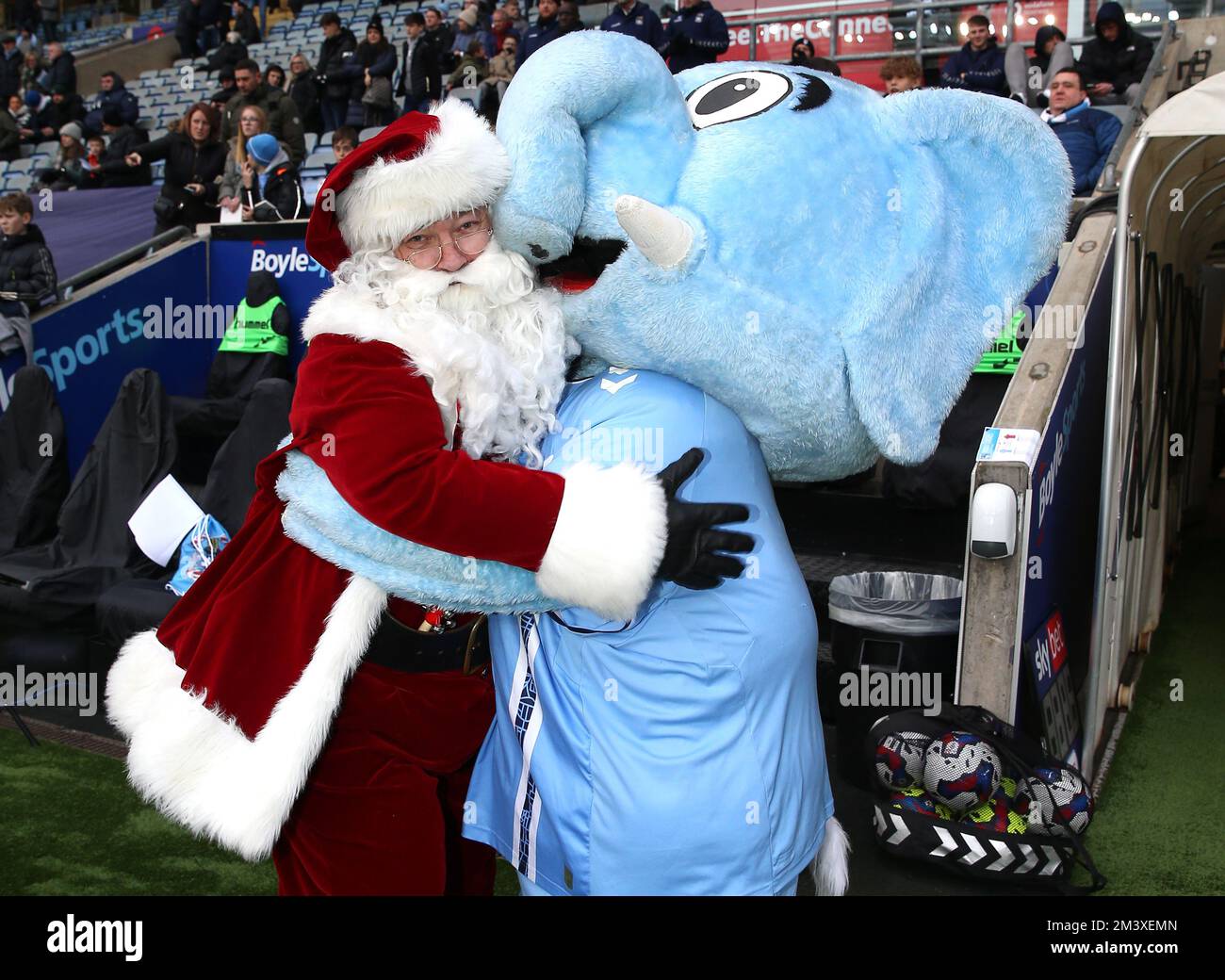 Santa Claus poses for a photo with Coventry City mascot Sky Bue Sam ...