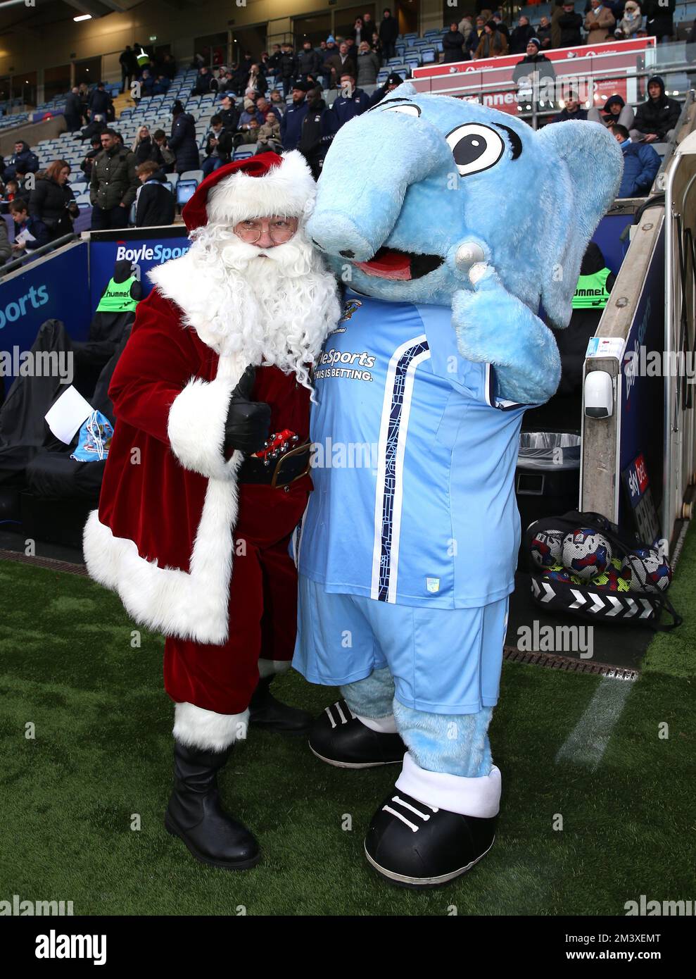 Santa Claus poses for a photo with Coventry City mascot Sky Bue Sam ...