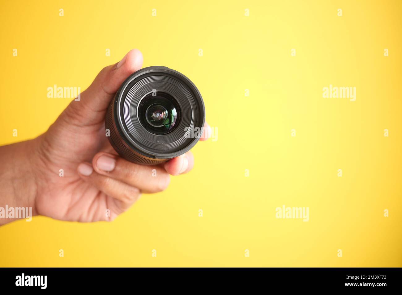 Top view holding camera lenses hi-res stock photography and images - Alamy