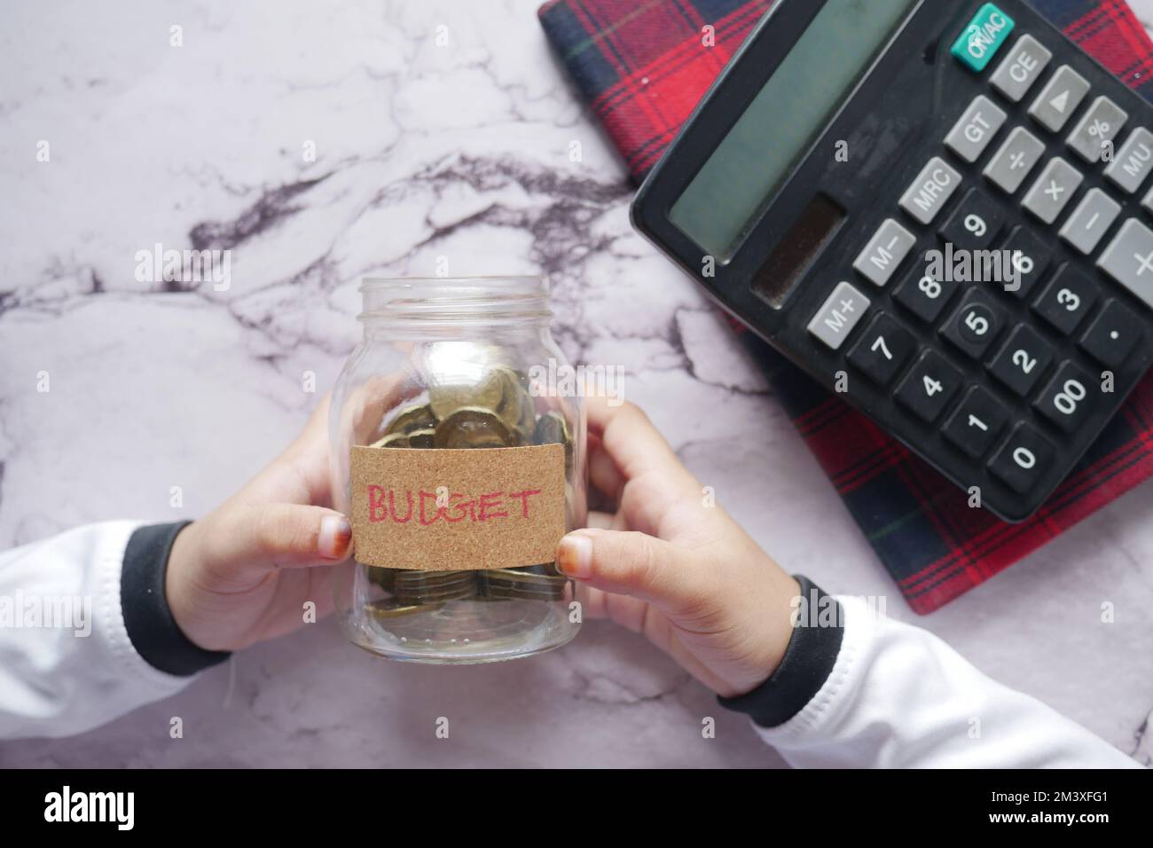 Child save jar hi-res stock photography and images - Alamy