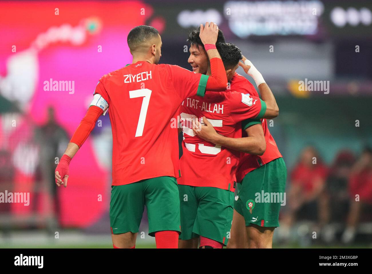 Achraf Dari of Morocco celebrates his goal with his teammates during ...