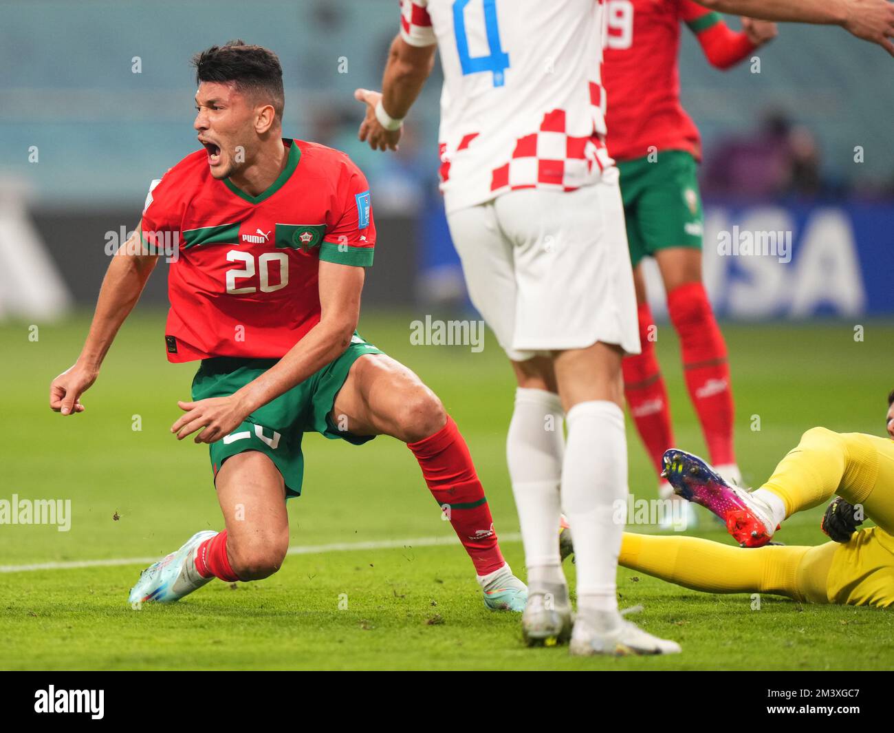 Achraf Dari of Morocco scores his goal during the FIFA World Cup Qatar ...