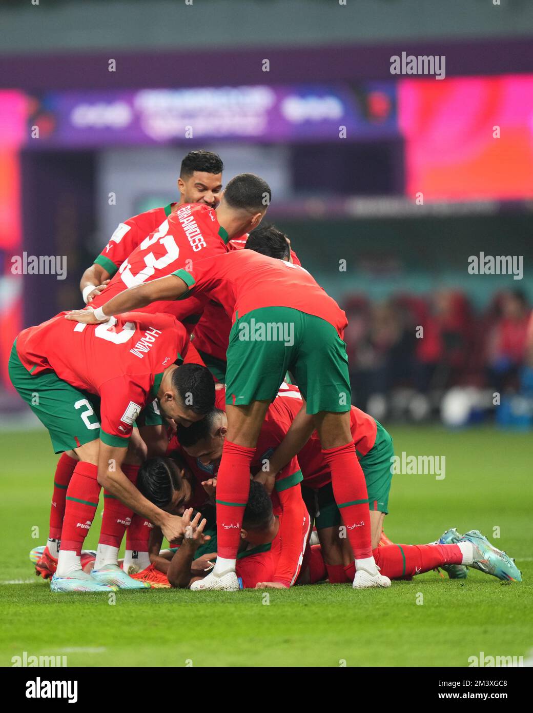 Achraf Dari of Morocco celebrates his goal with his teammates during ...
