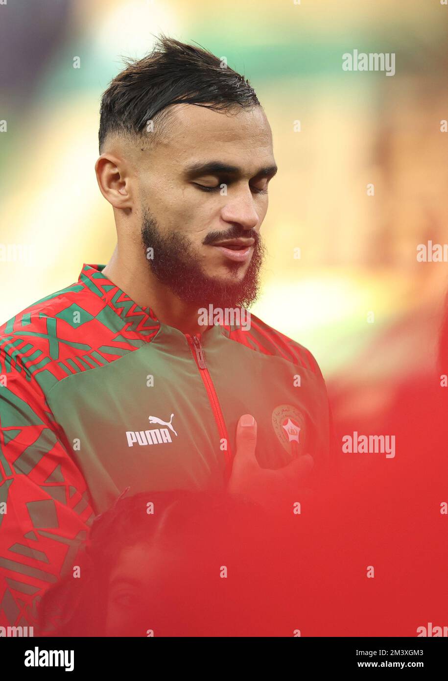 Doha, Qatar. 17th Dec, 2022. Sofiane Boufal of Morocco reacts during the national anthem prior ...