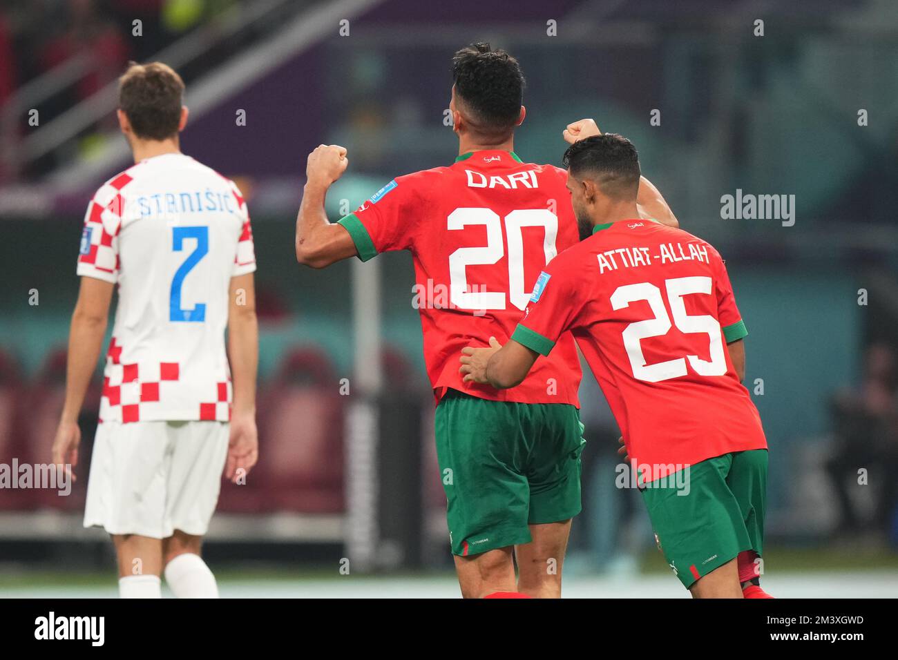 Achraf Dari of Morocco celebrates his goal with his teammates during ...
