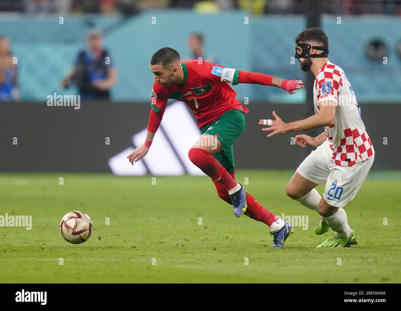 Morocco's Hakim Ziyech (left) and Croatia's Josko Gvardiol battle for ...