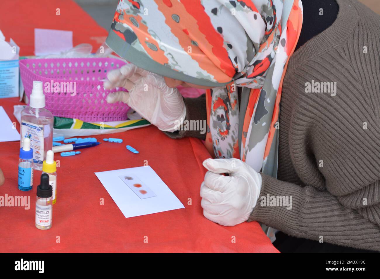 Cairo, Egypt, December 15 2022: ABO blood typing for checking the blood ...