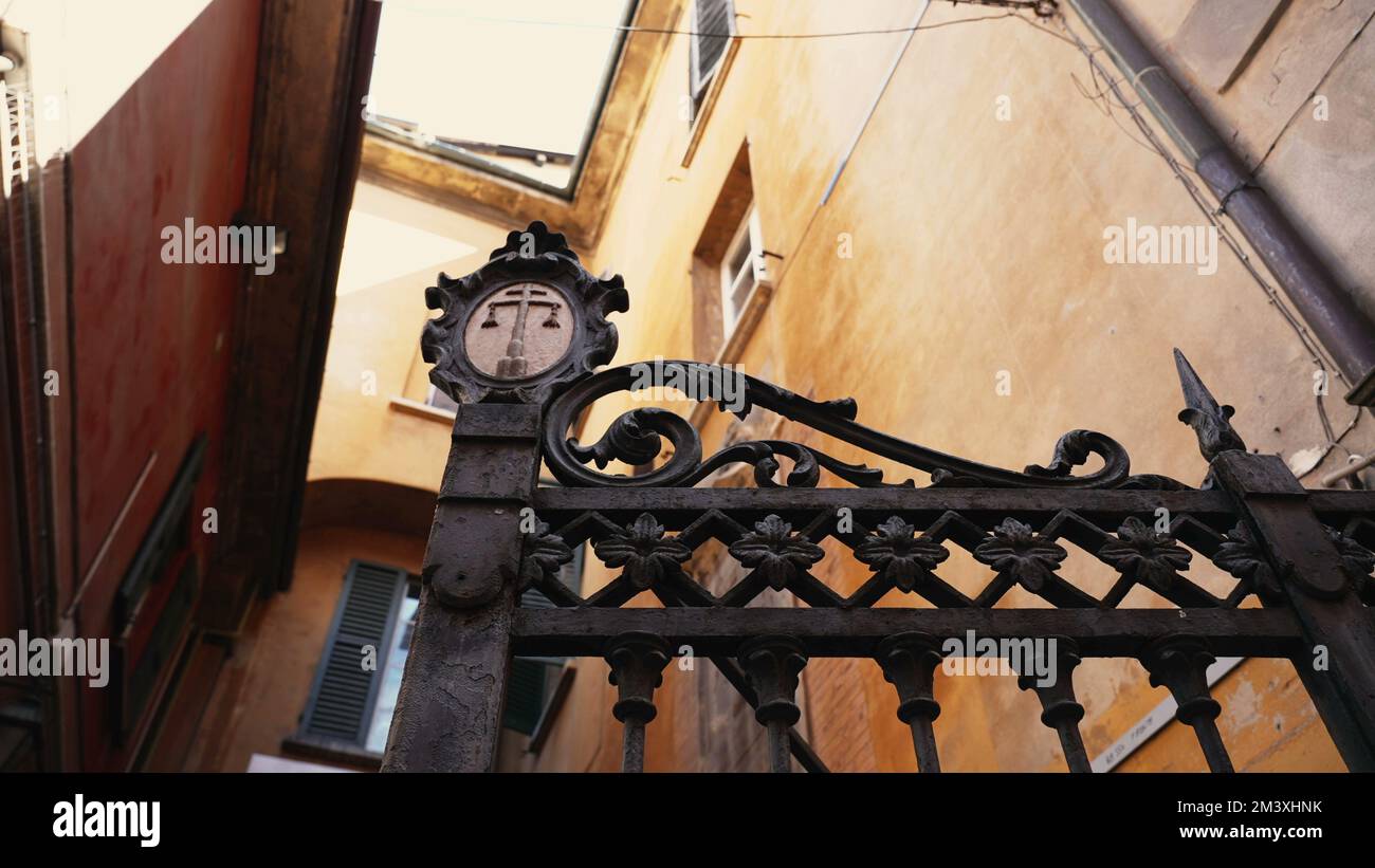 Ancient entrance metal gate with floral decoration. Old metal gate at ...