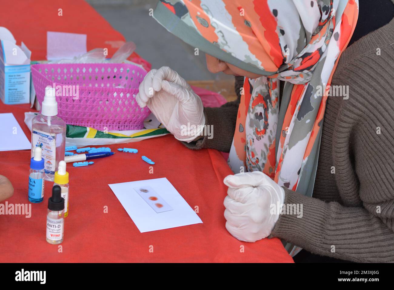 Cairo, Egypt, December 15 2022: ABO blood typing for checking the blood ...
