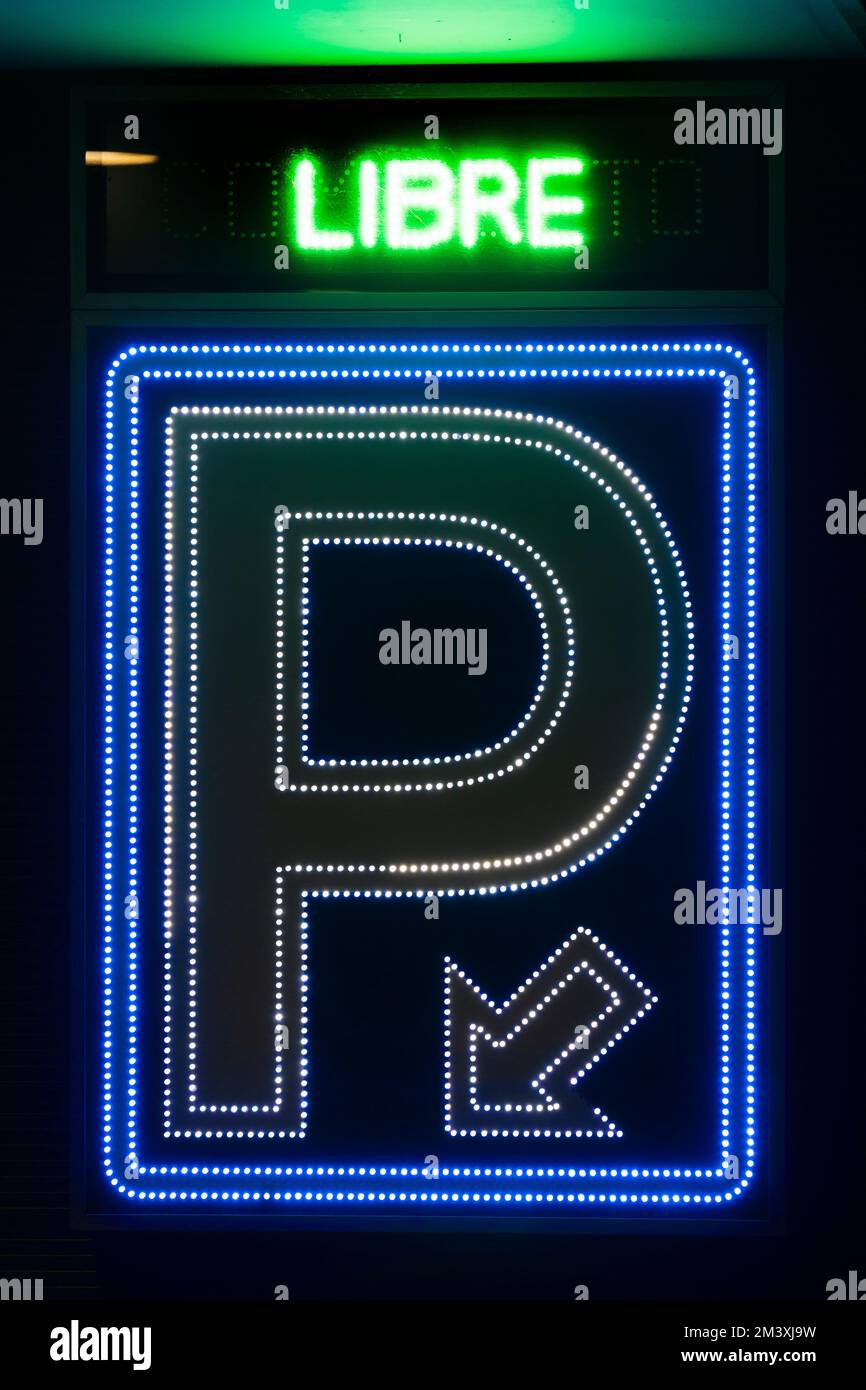 Sign neon parking arrow hi-res stock photography and images - Alamy