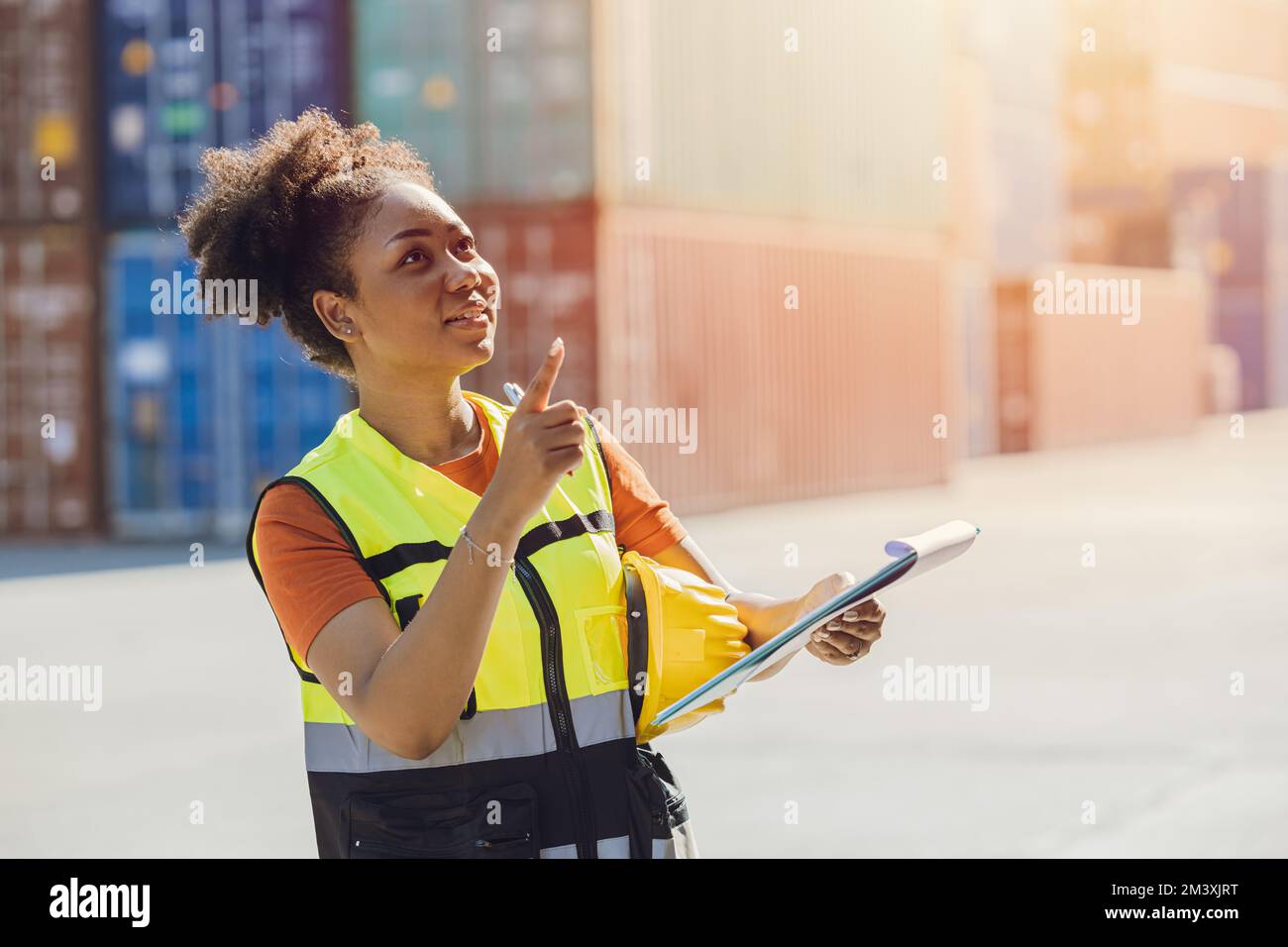 African woman cargo logistics industry staff worker happy working in ...