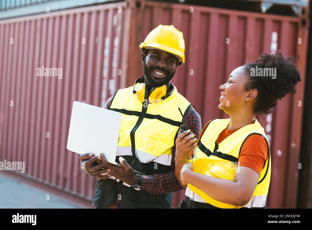 Teamwork, African worker couple happy working together port cargo ...