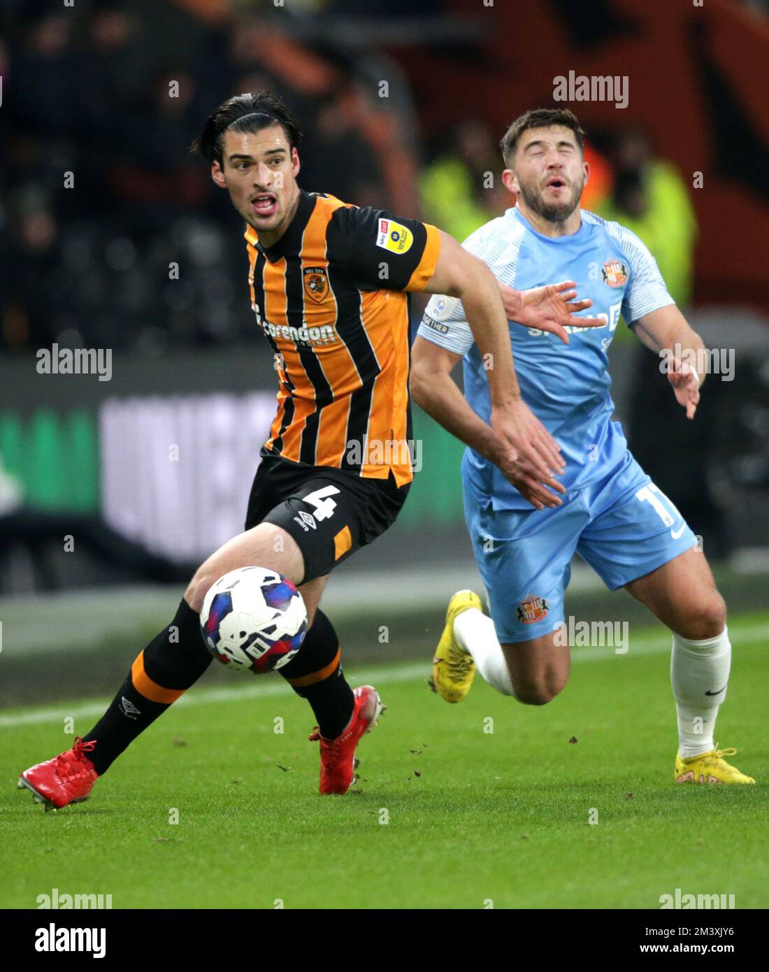 Hull City's Jacob Greaves (left) catches Sunderland's Lynden Gooch in ...