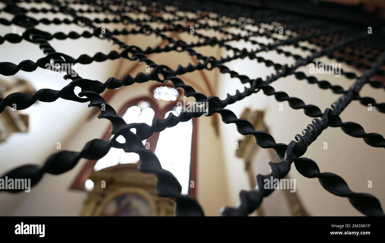 Metal patterns closeup inside Church Cathedral. Iron grid divide Stock ...