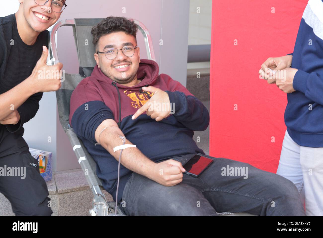 Cairo, Egypt, December 13 2022: collecting blood from blood volunteer ...