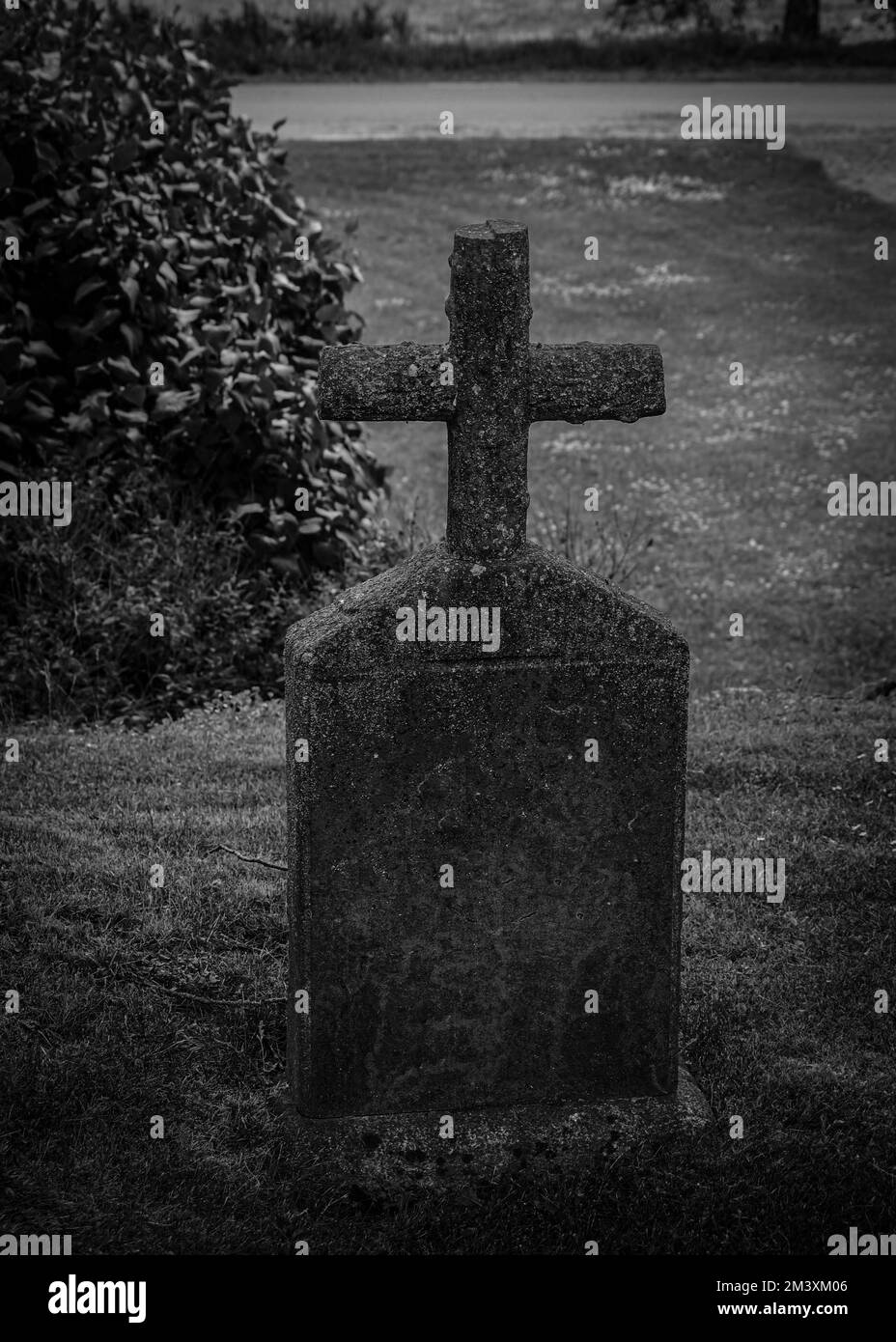 View of cross on a tombstone in black and white Stock Photo - Alamy