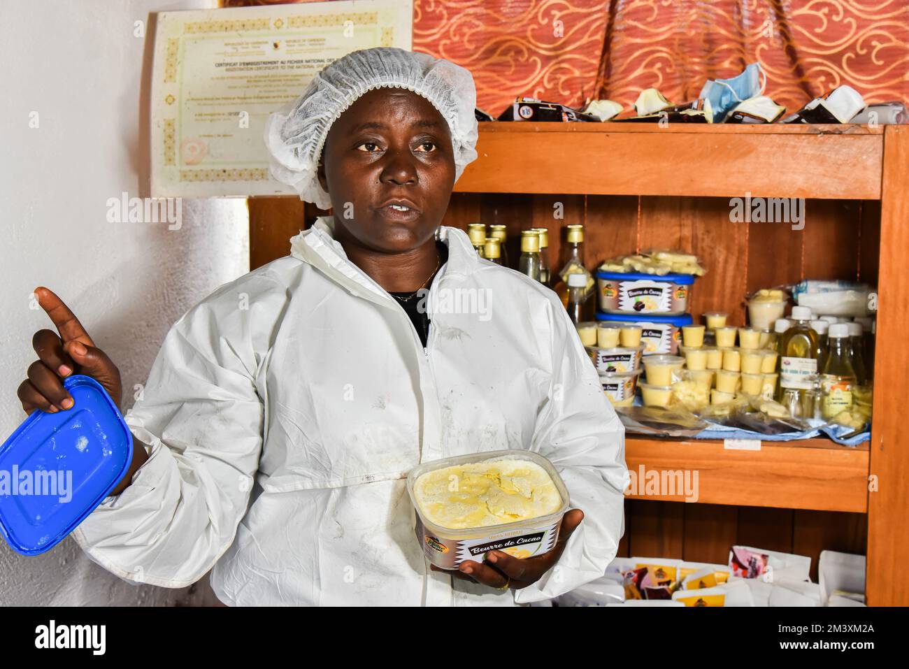 Yaounde, Cameroon. 6th Dec, 2022. Suzanne Ayolo presents cocoa butter ...