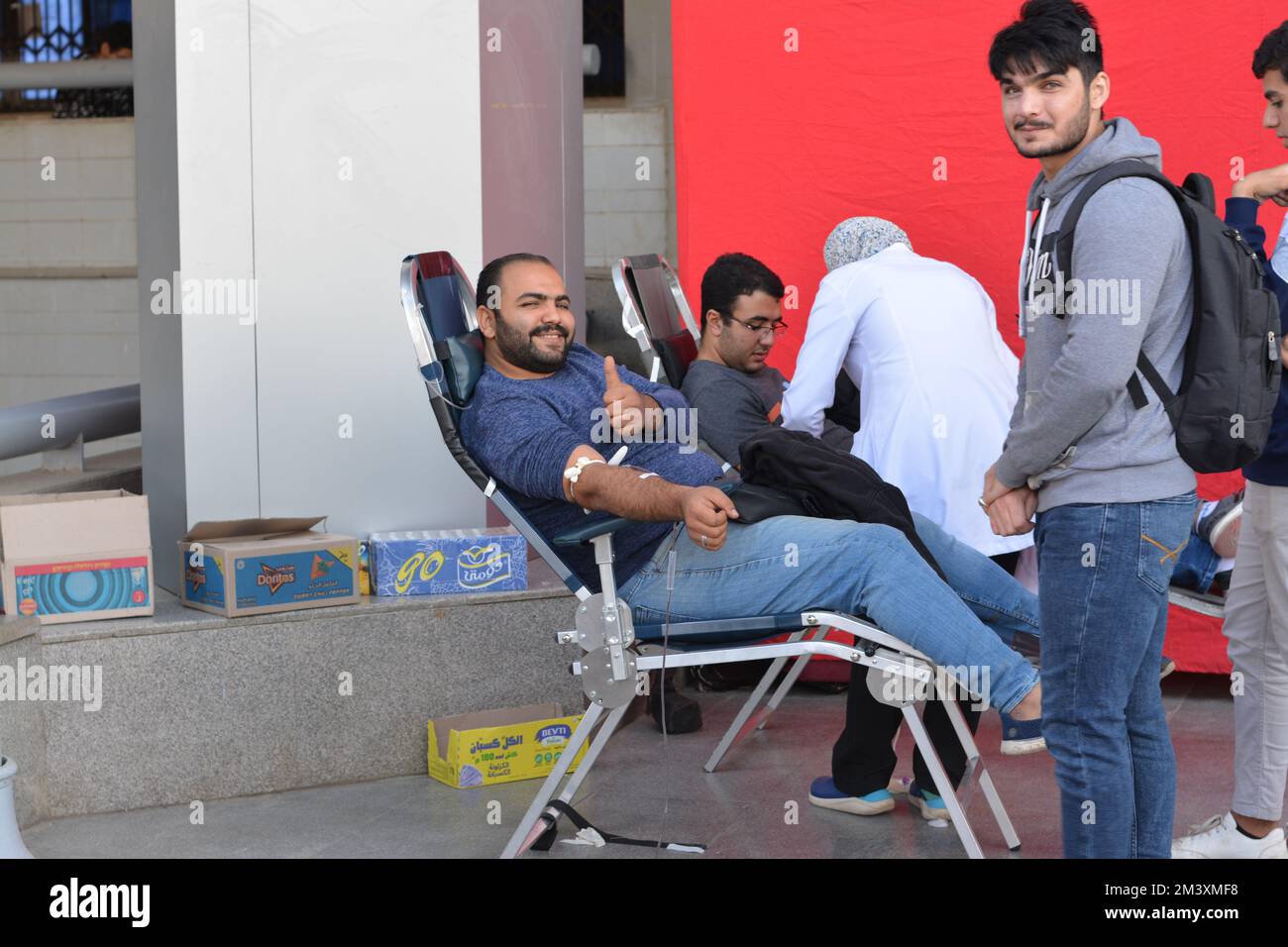 Cairo, Egypt, December 13 2022: collecting blood from blood volunteer ...