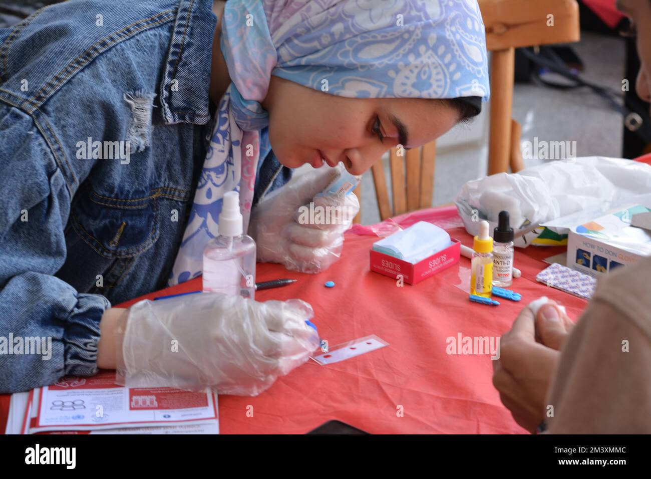 Cairo, Egypt, December 15 2022: ABO blood typing for checking the blood ...