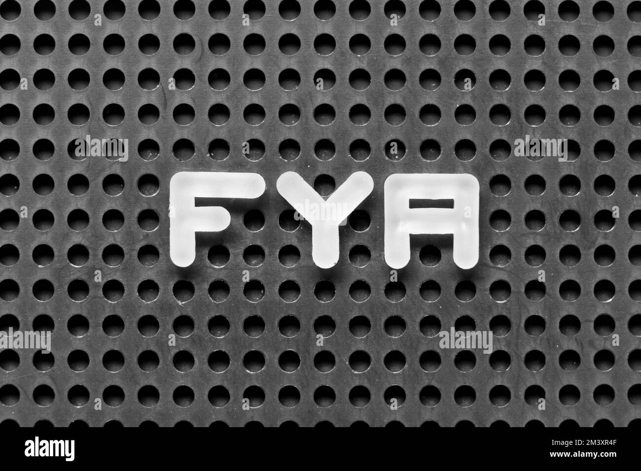 White alphabet letter in word FYA (Abbreviation of For your action or ...