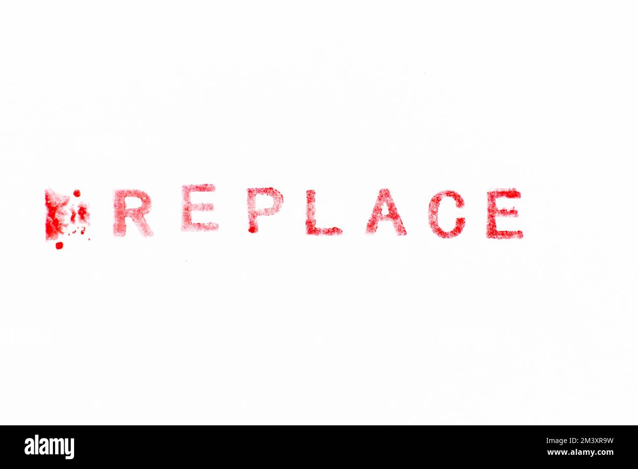 Red color ink rubber stamp in word replace on white paper background ...