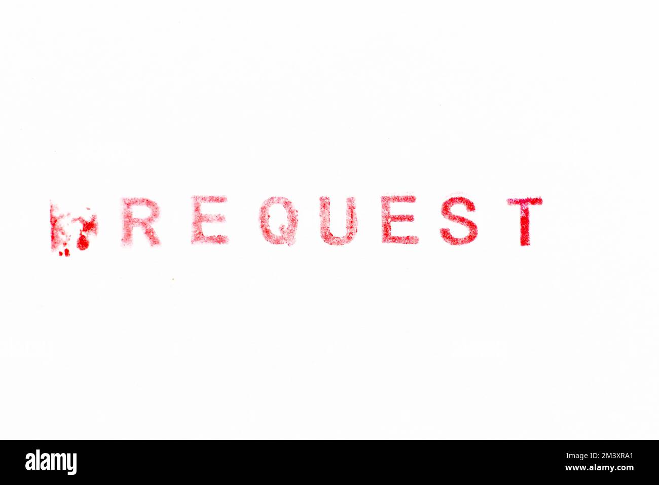 Red color ink rubber stamp in word request on white paper background ...