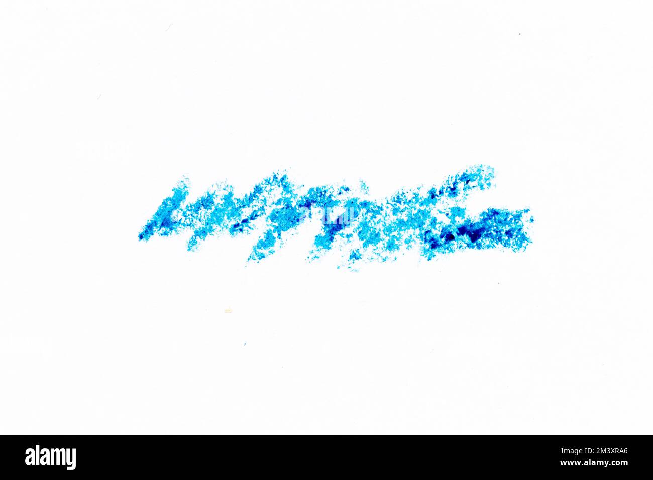 Blue color crayon hand drawing in sribble line shape on white paper ...