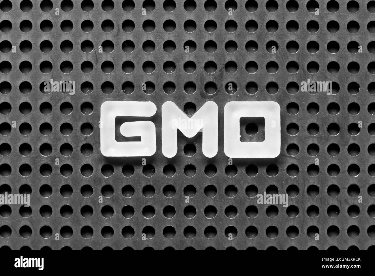 White alphabet letter in word GMO (abbreviation of Genetically Modified ...