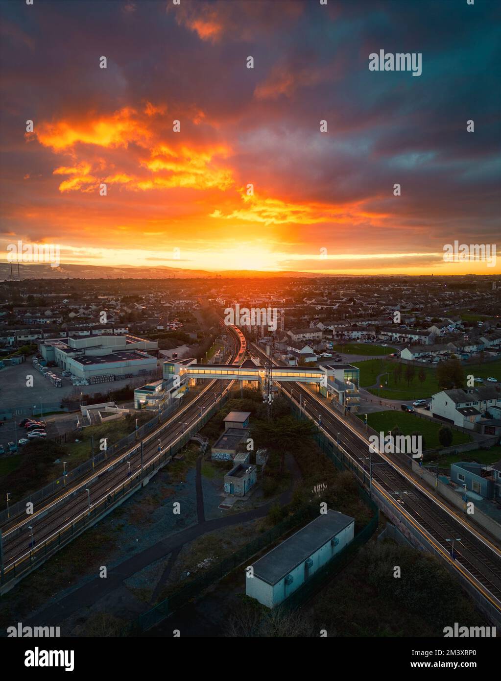 Fiery December sunset sky at Howth Junction Stock Photo - Alamy