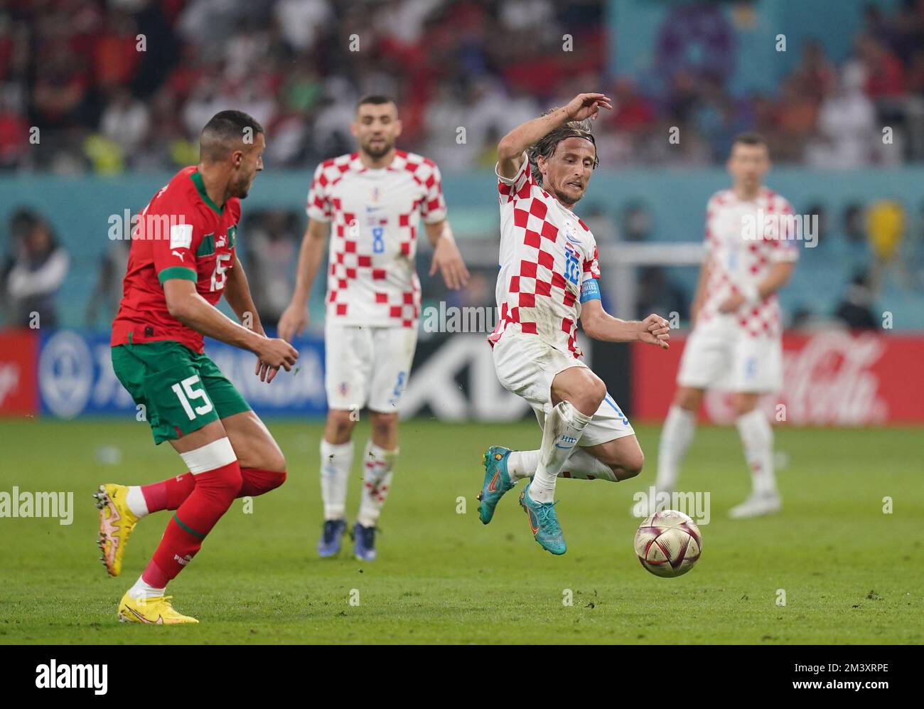 Morocco's Selim Amallah (left) and Croatia's Luka Modric battle for the ...