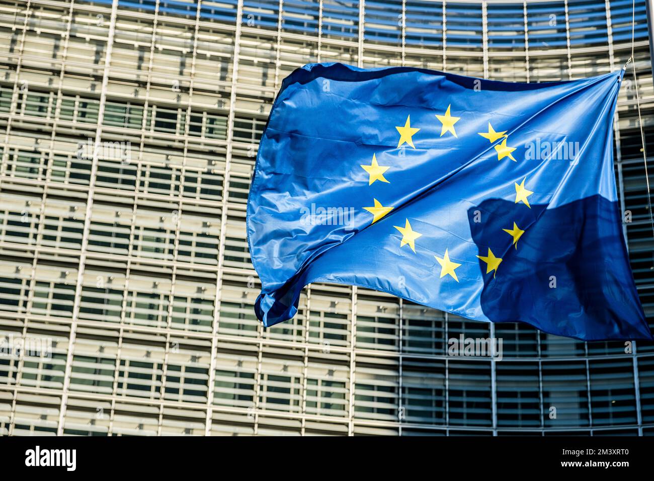 Several official European Flags with the blue and the yellow stars are ...